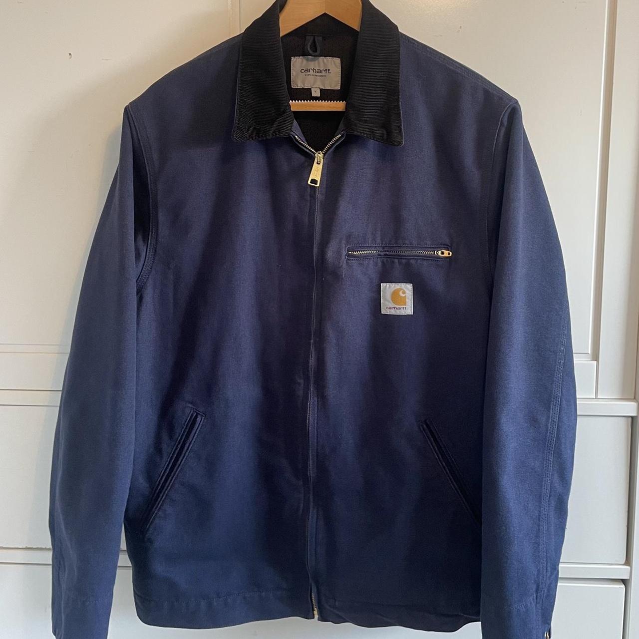 Dark blue Carharrt Detroit jacket, in size L, fits... - Depop