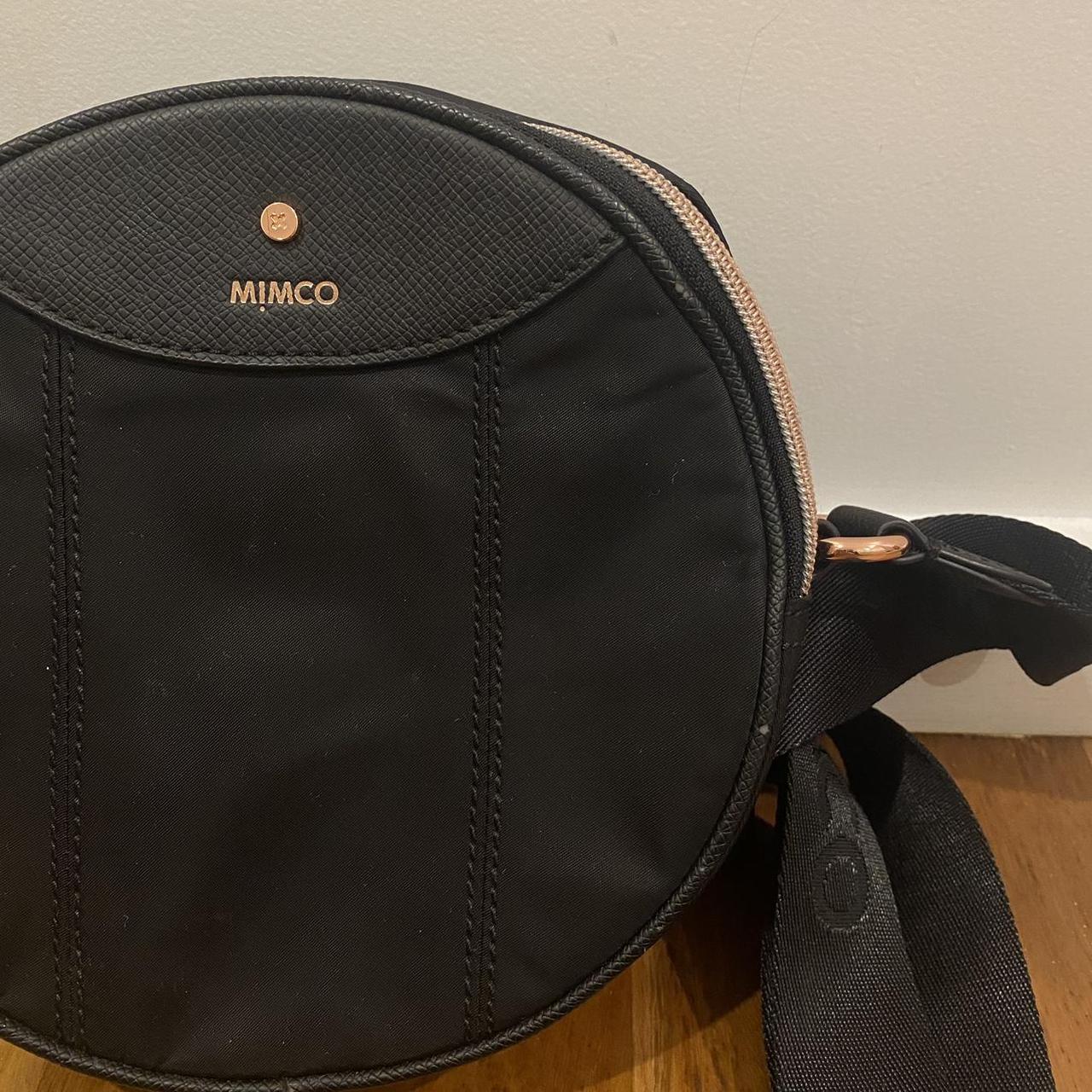 Mimco black round handbag. In near new condition.... - Depop