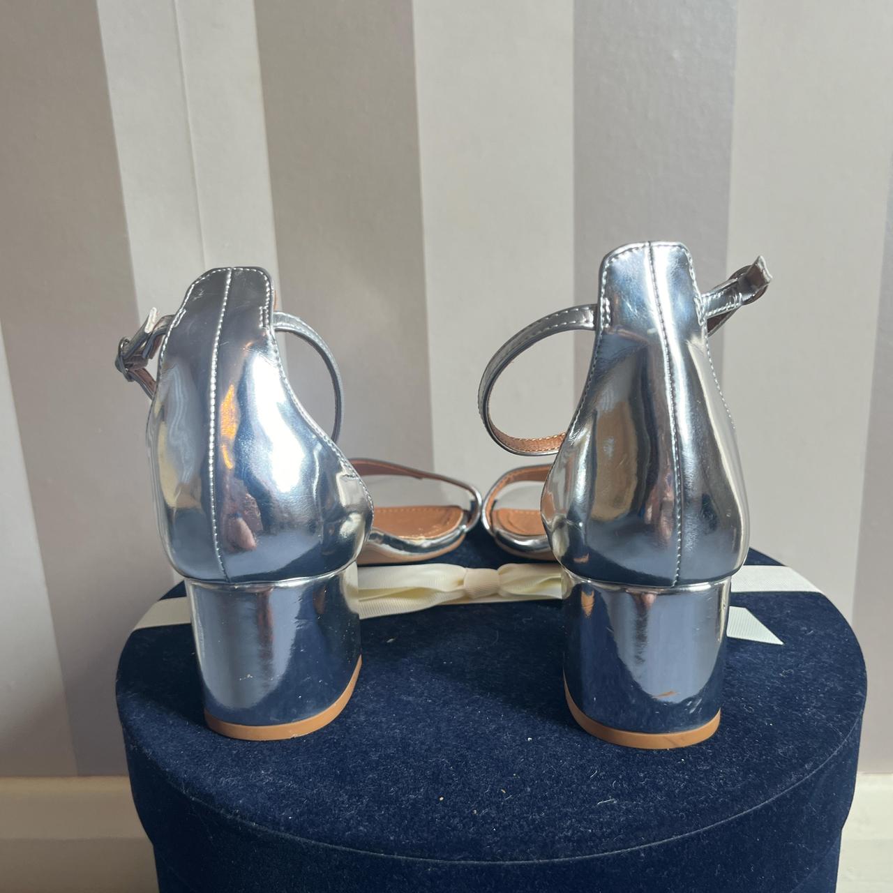 Silver metallic sandals with a 3 inch heel. Never... - Depop