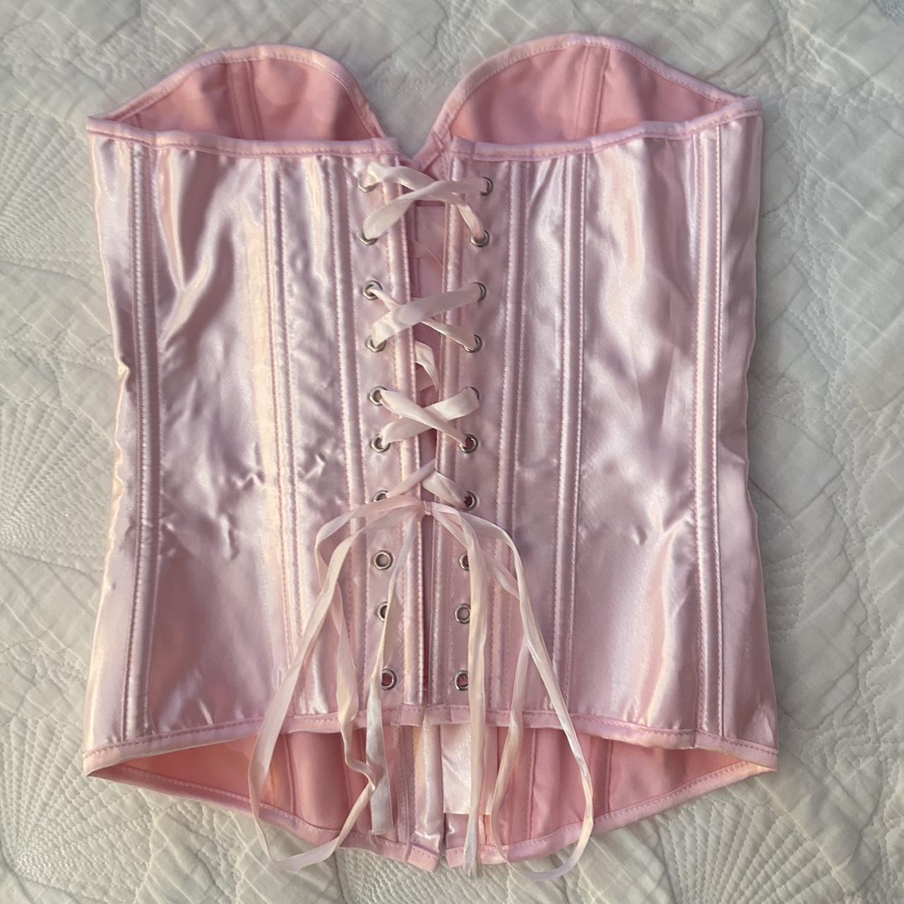 baby pink corset top listed as an xs, but can fit... - Depop