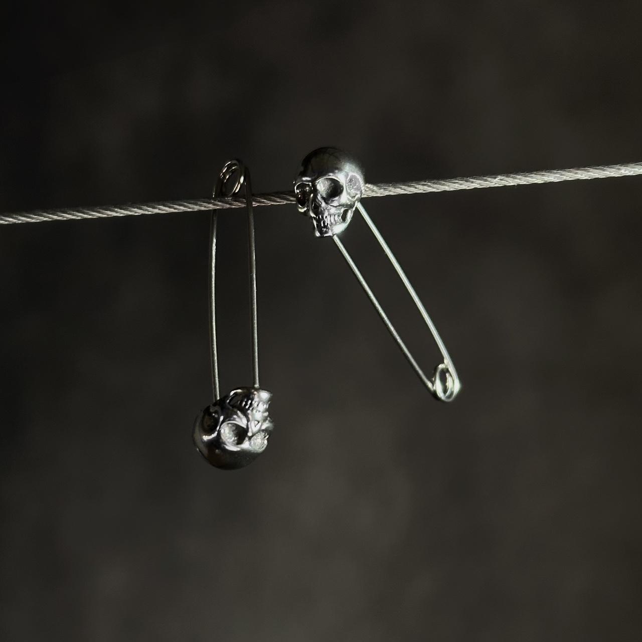 Realms of Infinity Skull Safety Pin Earrings 100%... - Depop