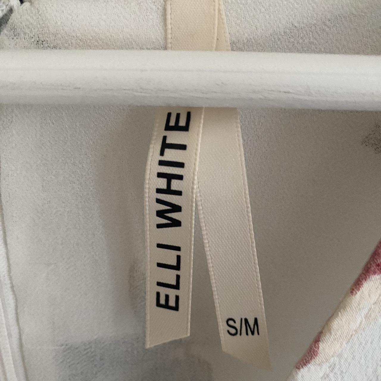 Elli White floral long sleeve summer playsuit, size... - Depop