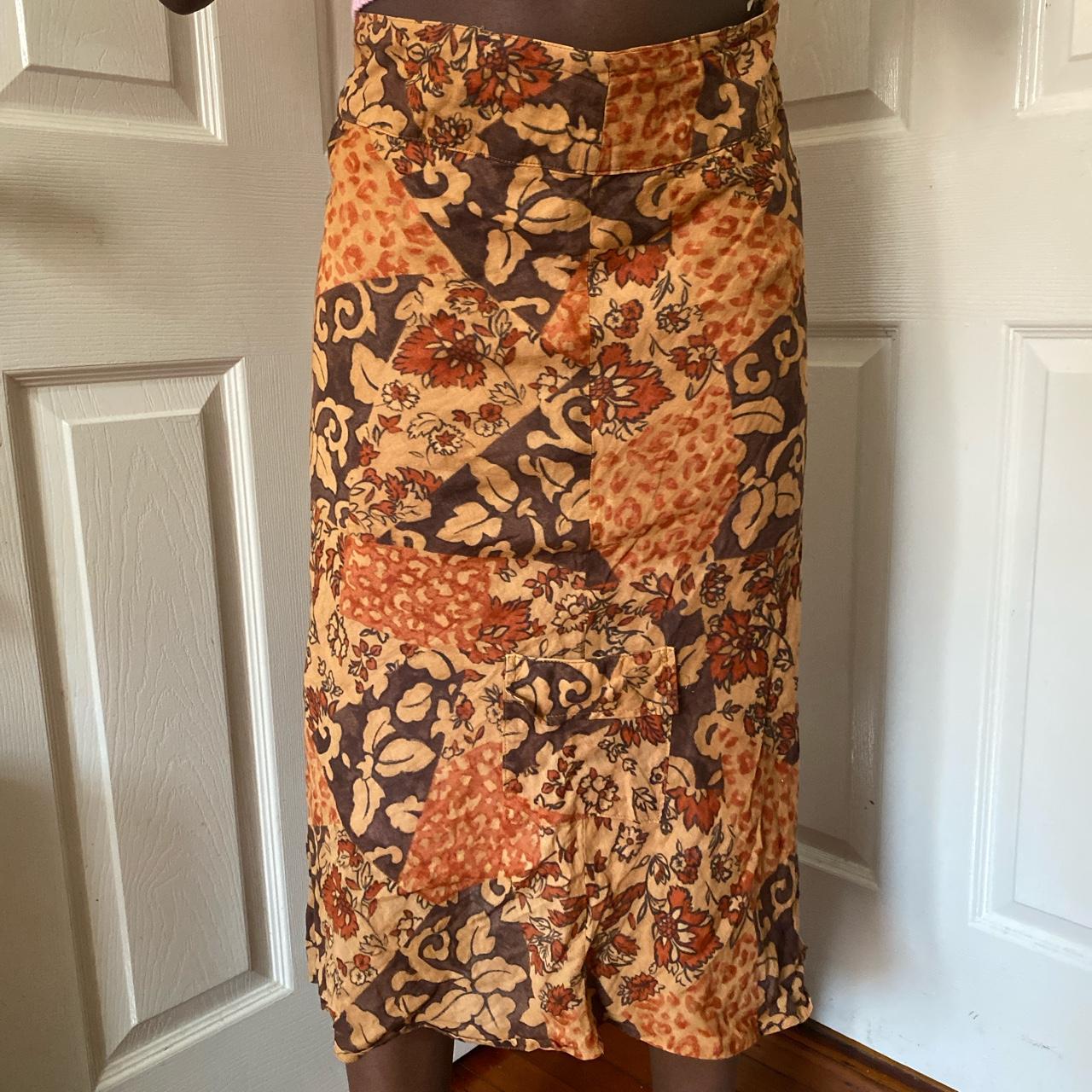 orange floral midi skirt. waist 16in length 31in - Depop