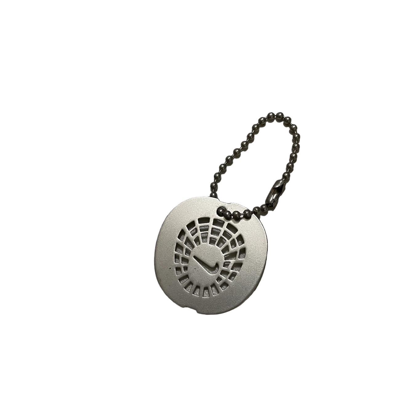 Nike silver keychain Unisex - Depop