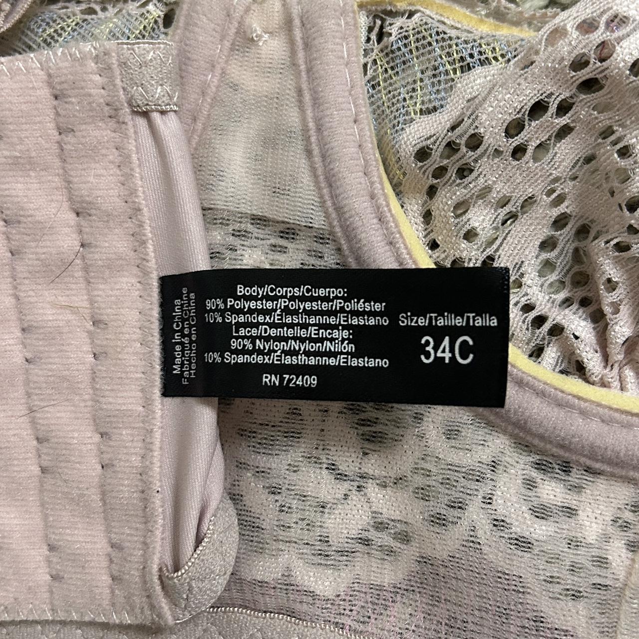 34 C light pink bra with lace detailing, and bow on... - Depop