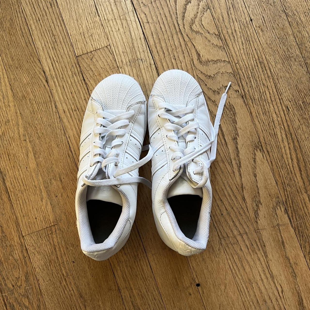 Adidas white shell toe sneakers. Run a half size... - Depop