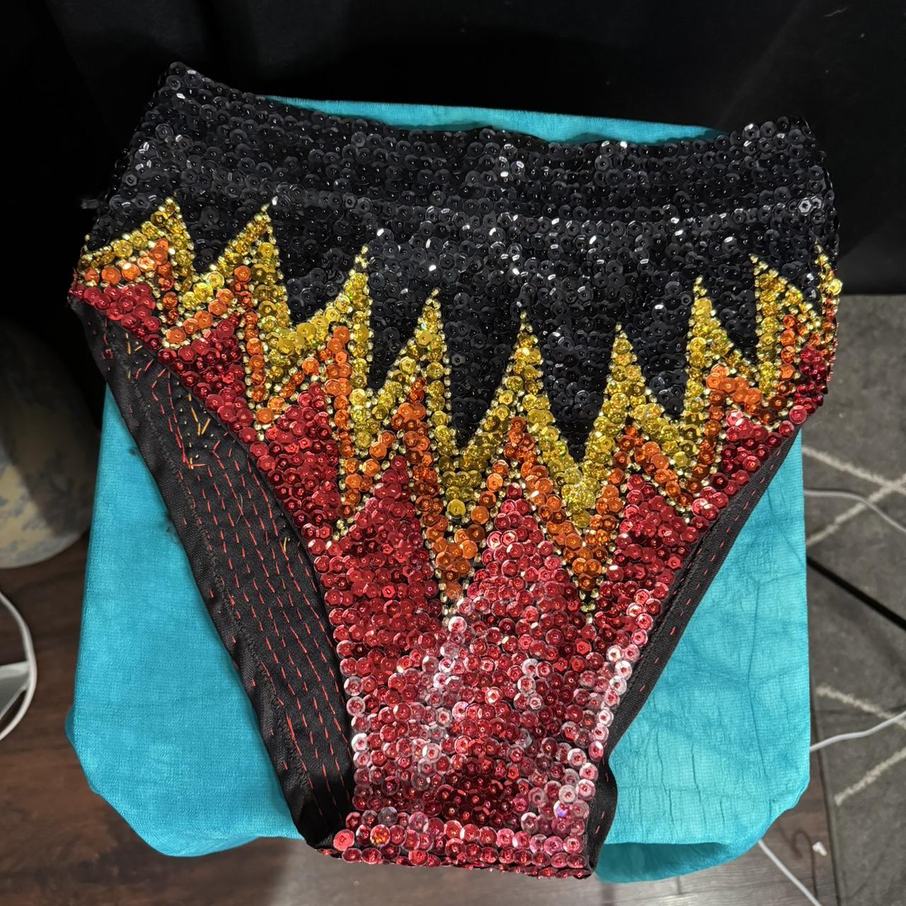 Easy tiger, flame bottoms! Some discoloration but... - Depop