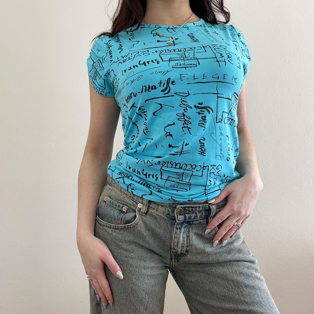 Blue graphic tee Y2K 2000s 90s vintage Shown on a... - Depop