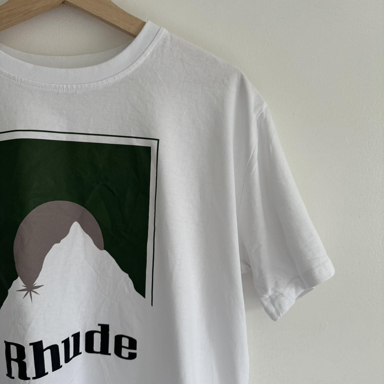 White Rhude T-shirt (pictured from the back of the... - Depop