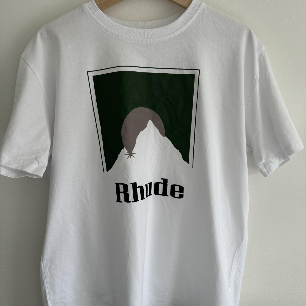 White Rhude T-shirt (pictured from the back of the... - Depop