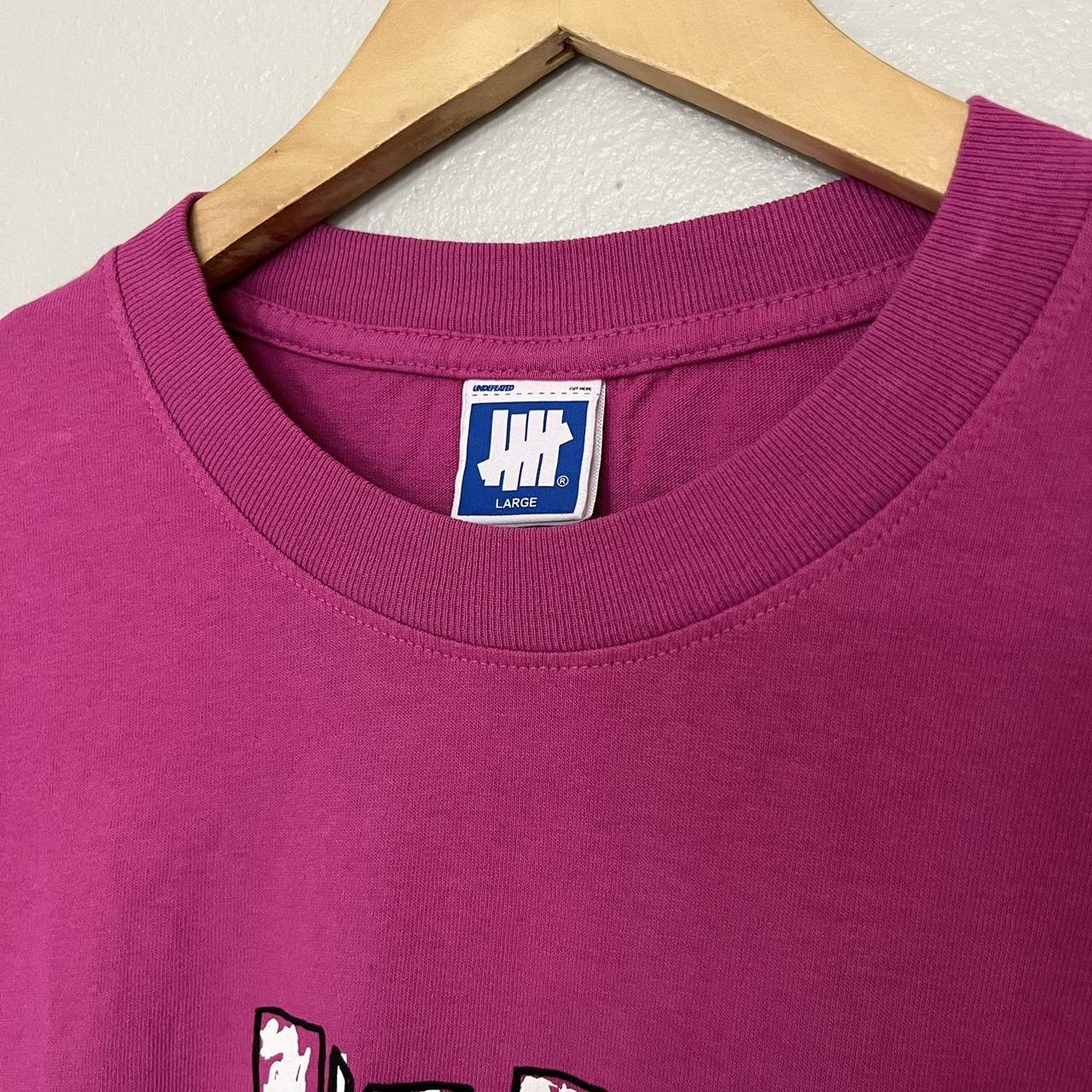 Pink Undefeated sport t shirt #undefeated #stussy... - Depop