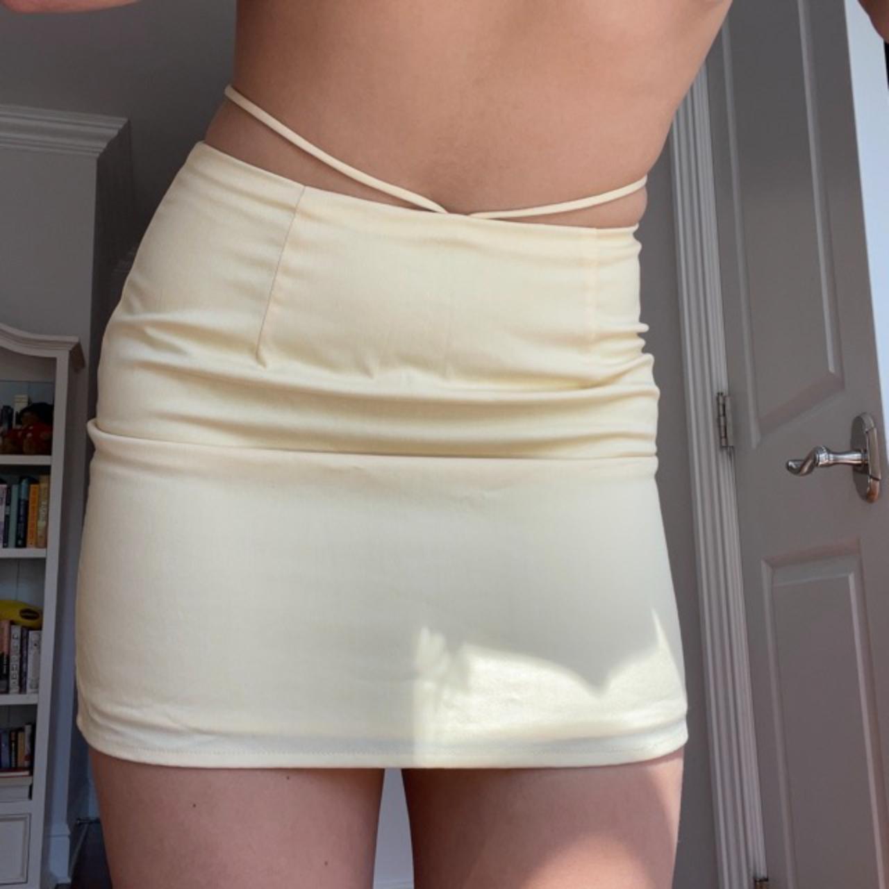 emory park pale yellow mini skirt the string on the... - Depop