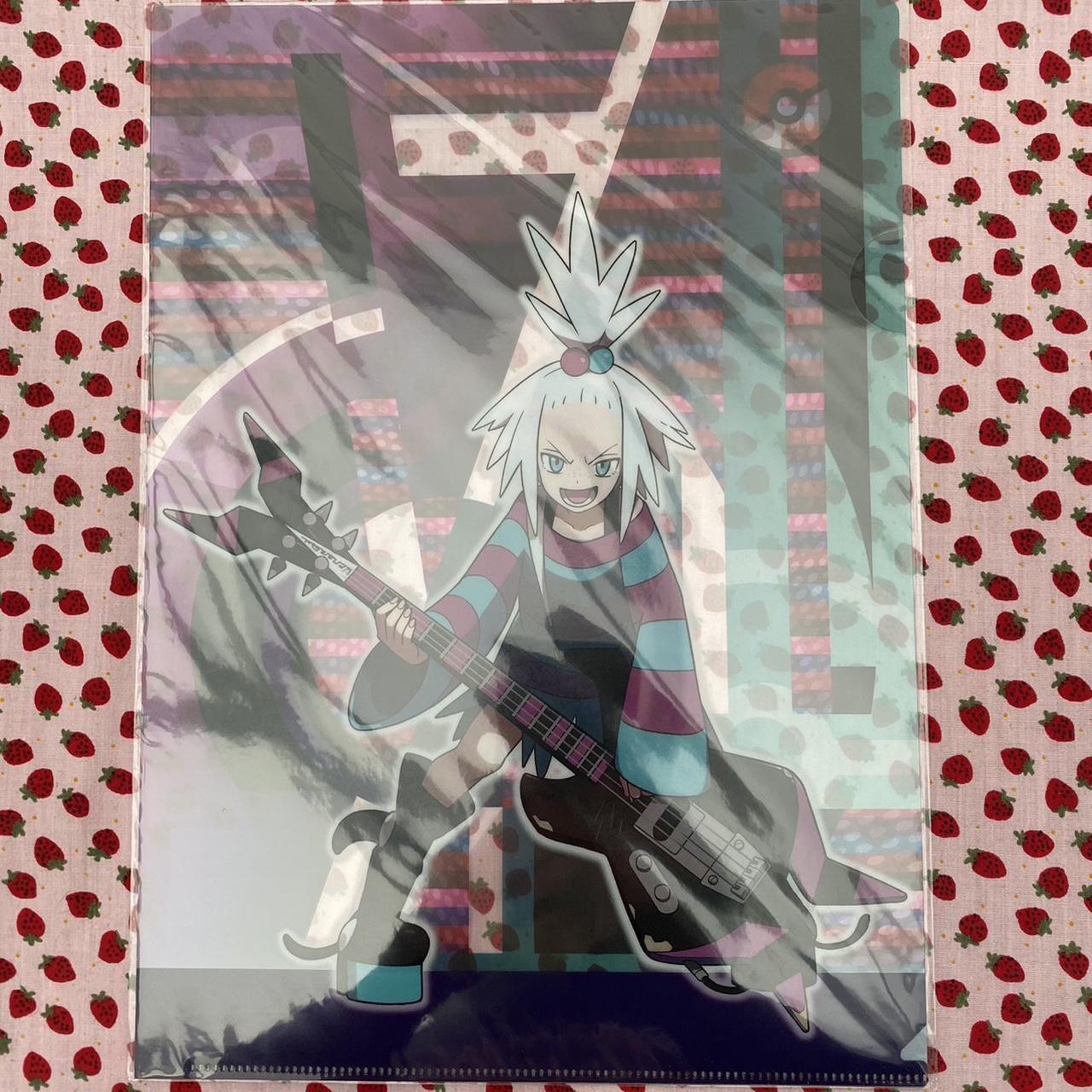 Pokémon file from Pokémon center featuring... - Depop