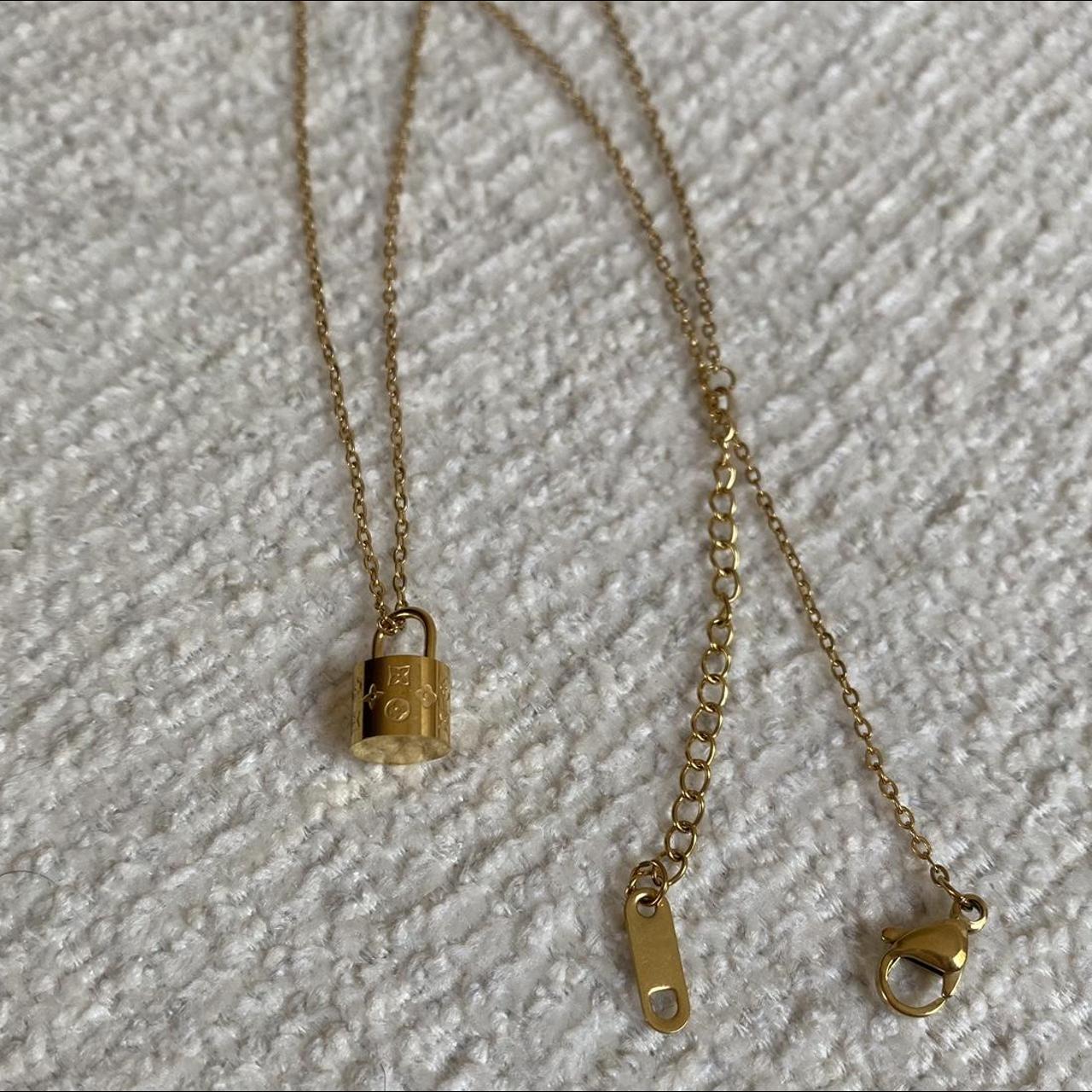 Reworked LV inspired mini lock necklace. Designed by... - Depop
