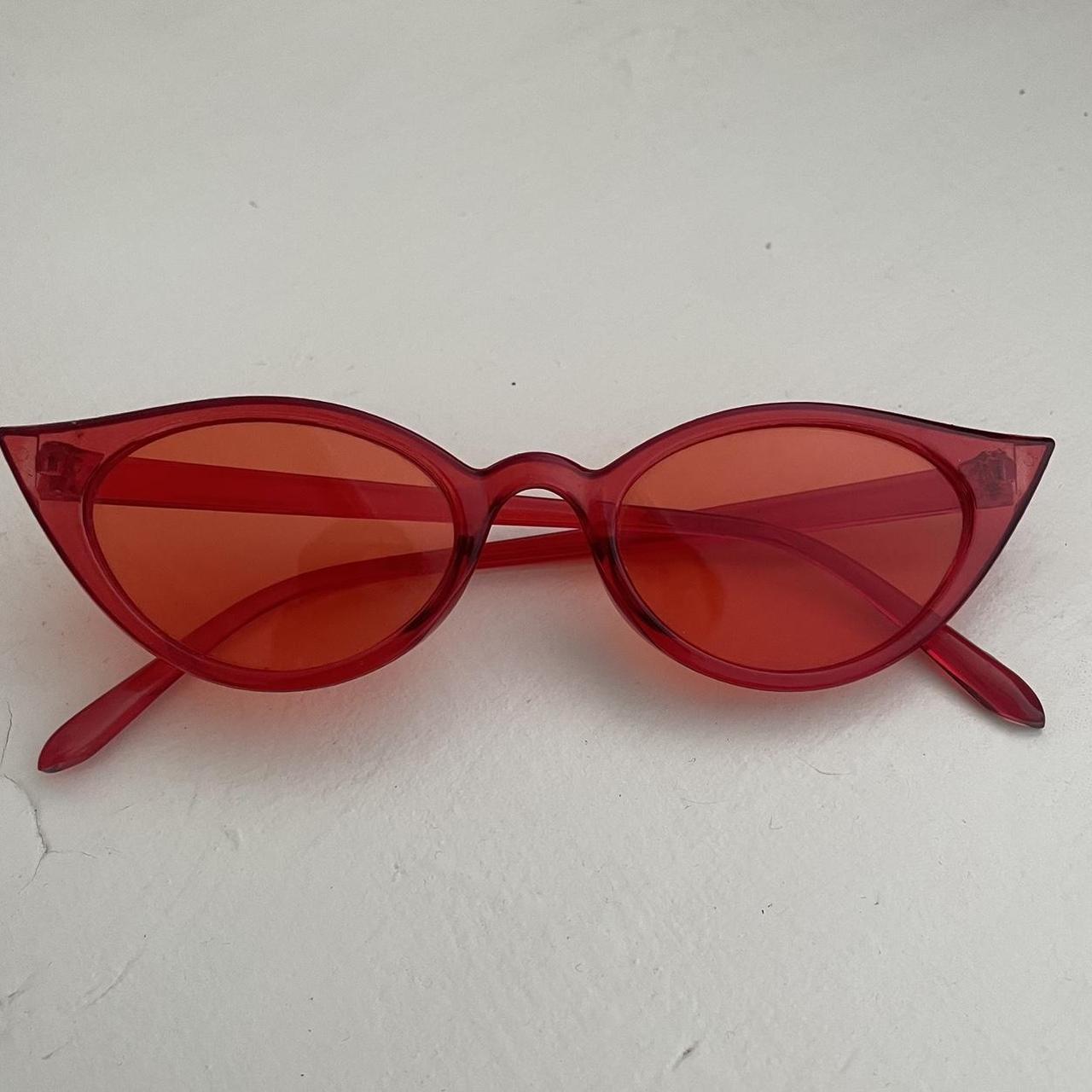 Red cat eye sunglasses. Worn a few times - Depop