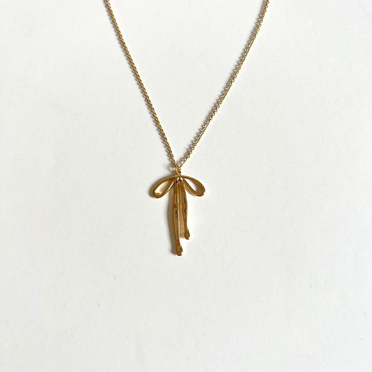Gold bow charm necklace! 18k plated gold= no... - Depop