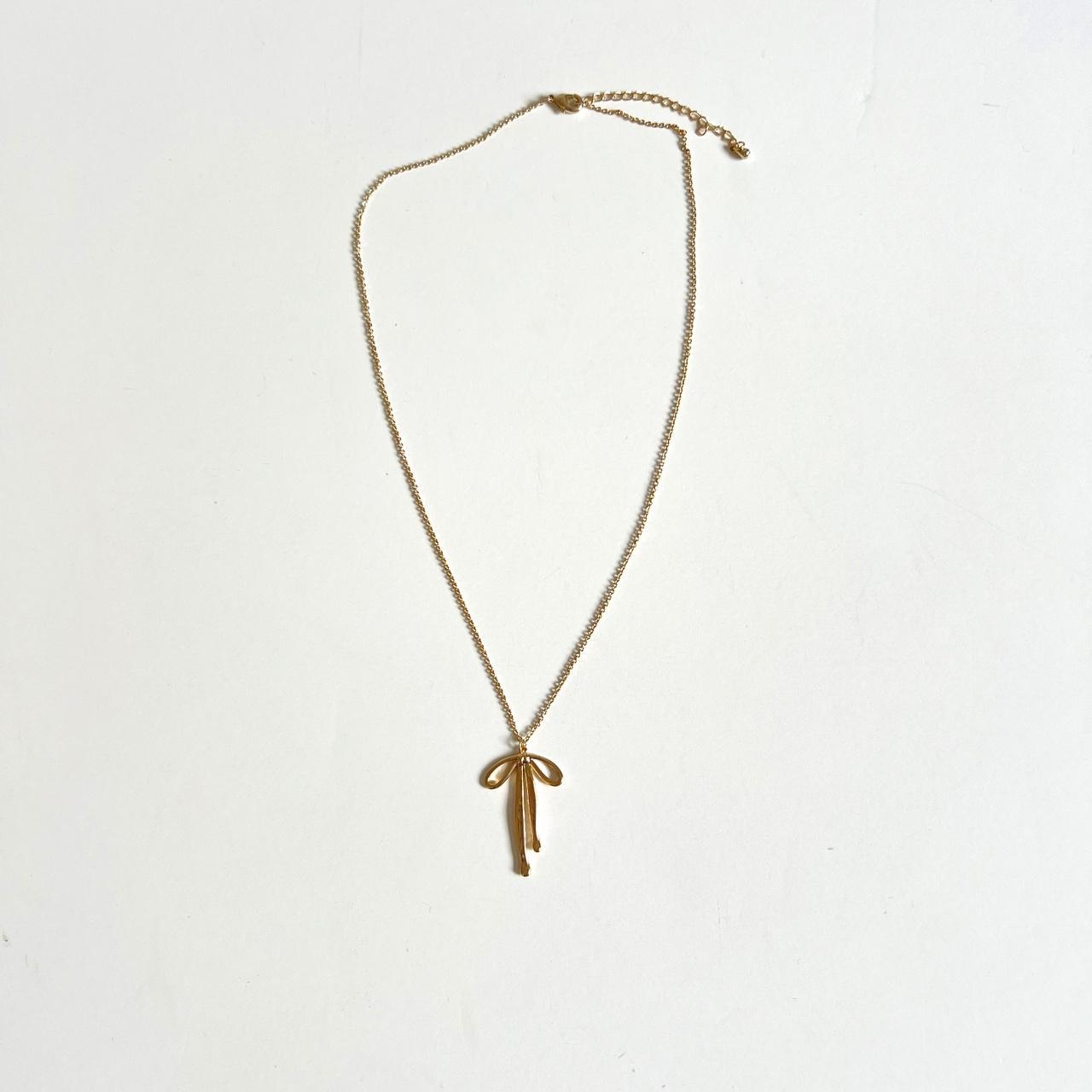 Gold bow charm necklace! 18k plated gold= no... - Depop