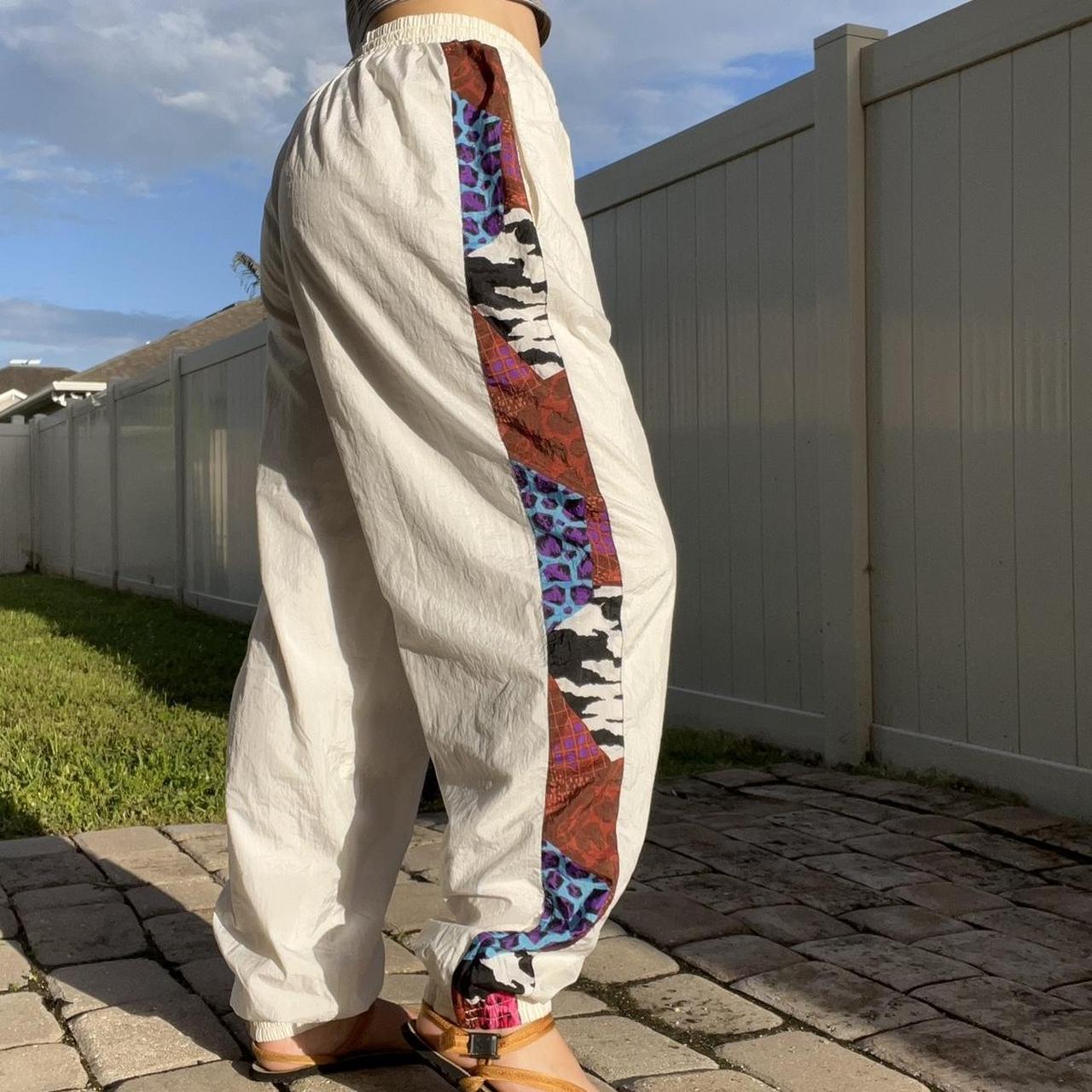 vintage Razzle exotic pattern windbreaker sweatpants... - Depop