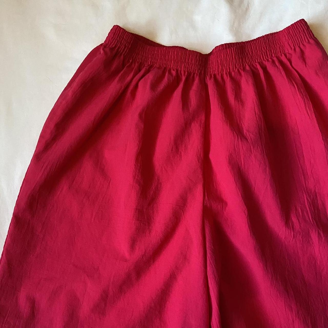 Vintage 80s high waisted baggy pink sporty shorts.... - Depop