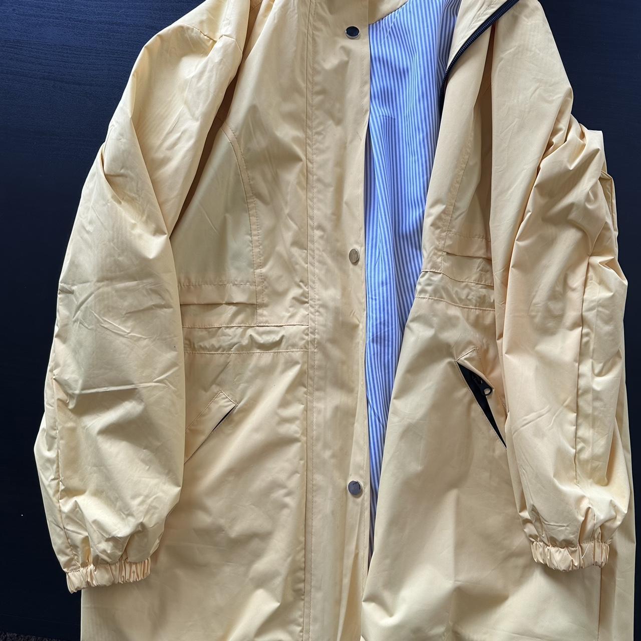 yellow raincoat with blue and white striped inner... - Depop