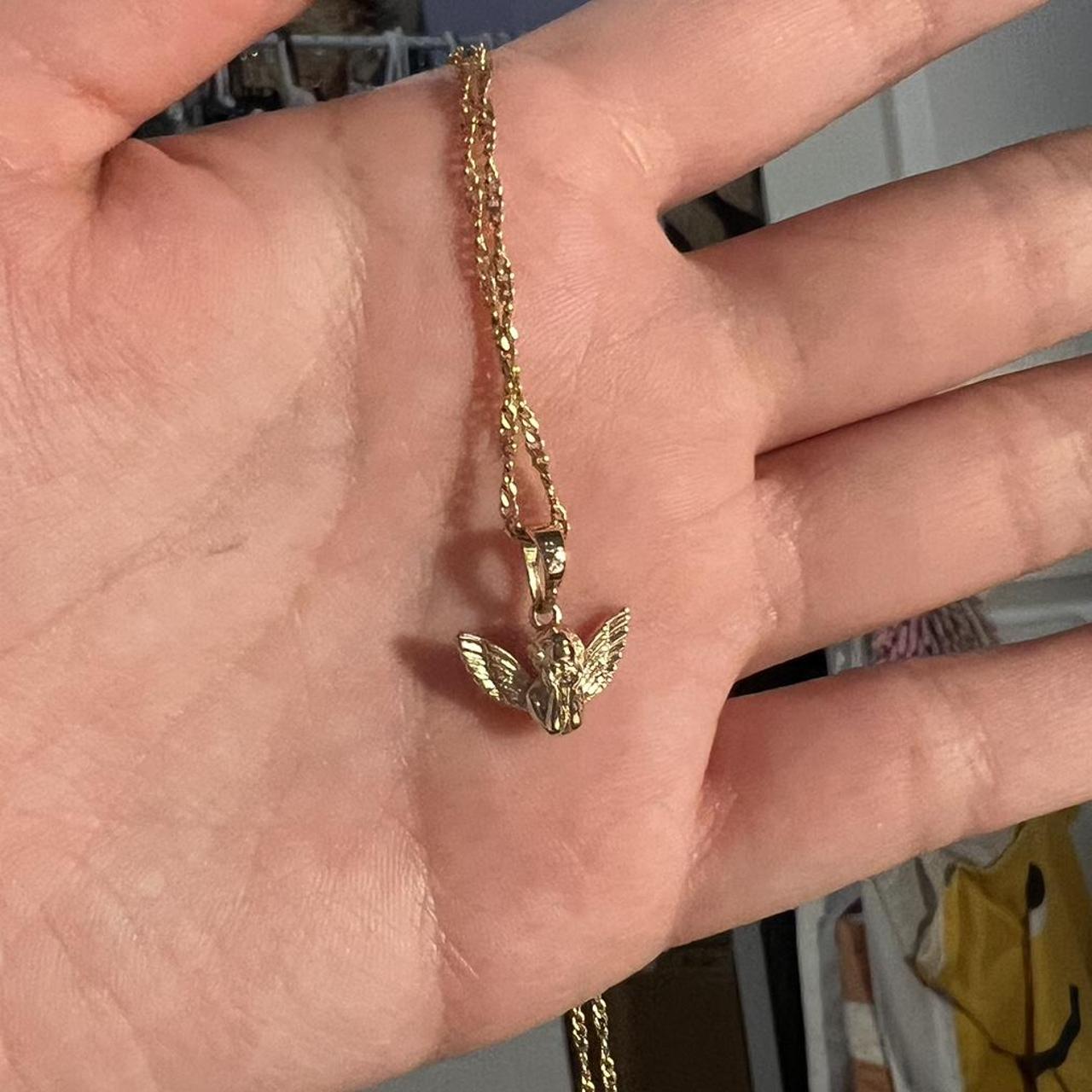 Gold baby angel pendant necklace from girls crew !... - Depop
