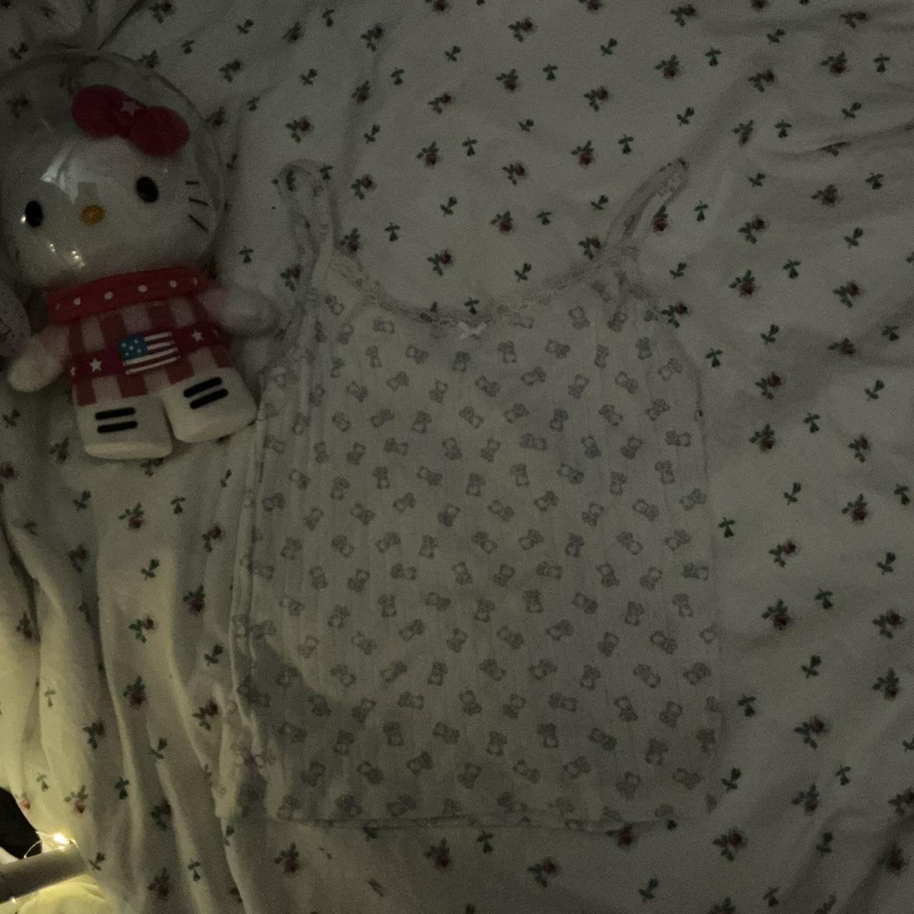 Brandy Melville teddy bear tank with bow worn a... | Depop