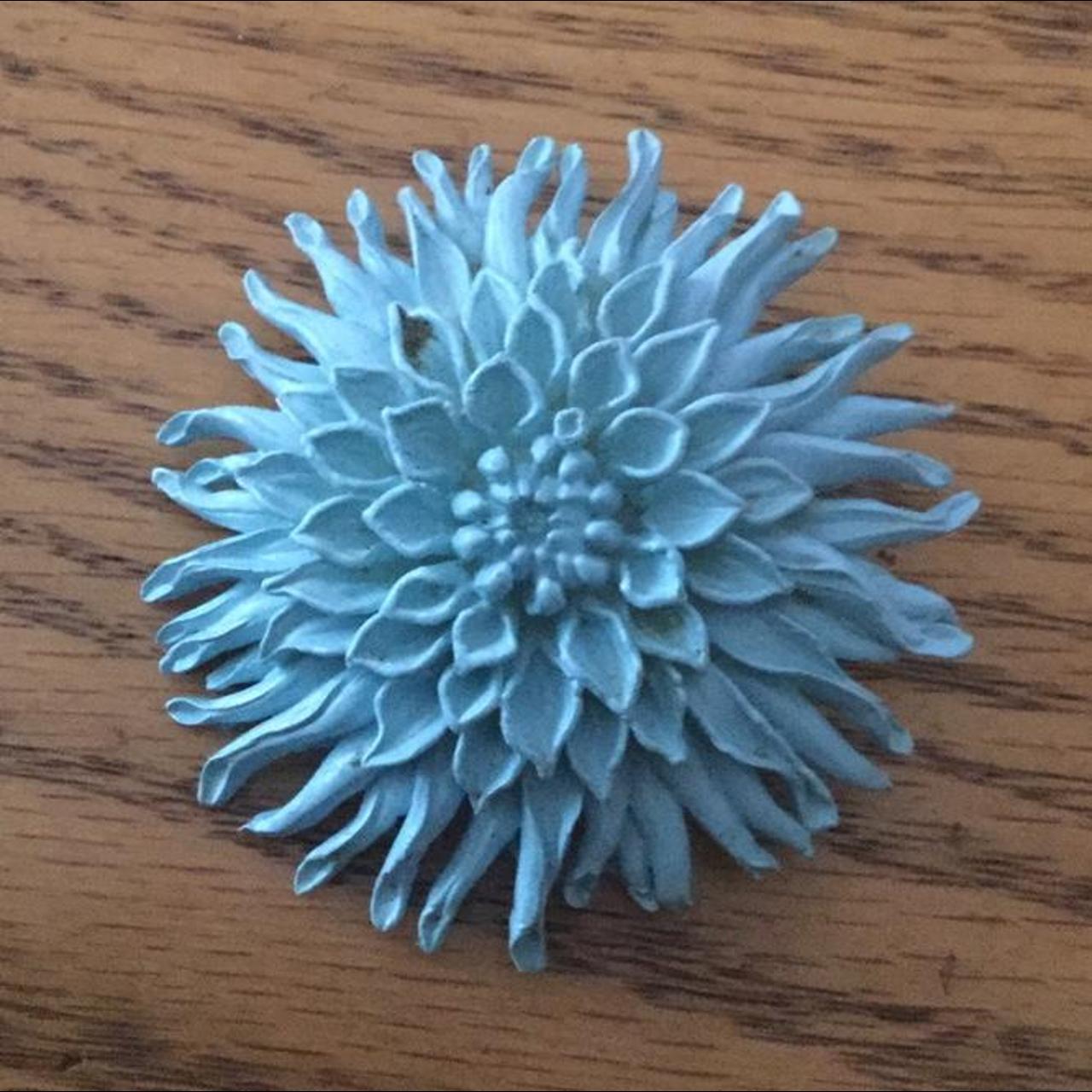 Vintage unmarked baby blue mum pin. Some sort of... - Depop