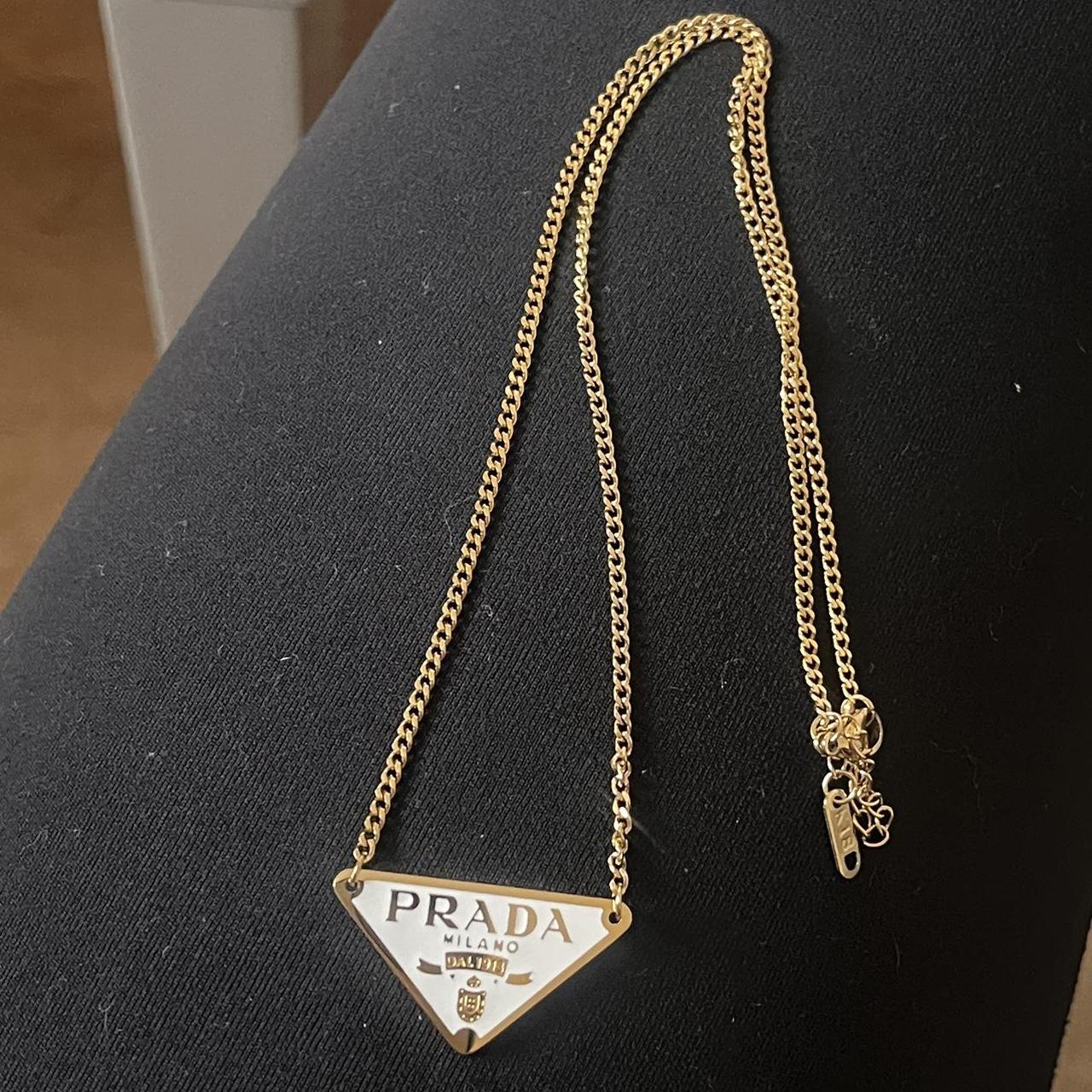 1 REMAINING REWORKED WHITE PRADA GOLD CHAIN... - Depop