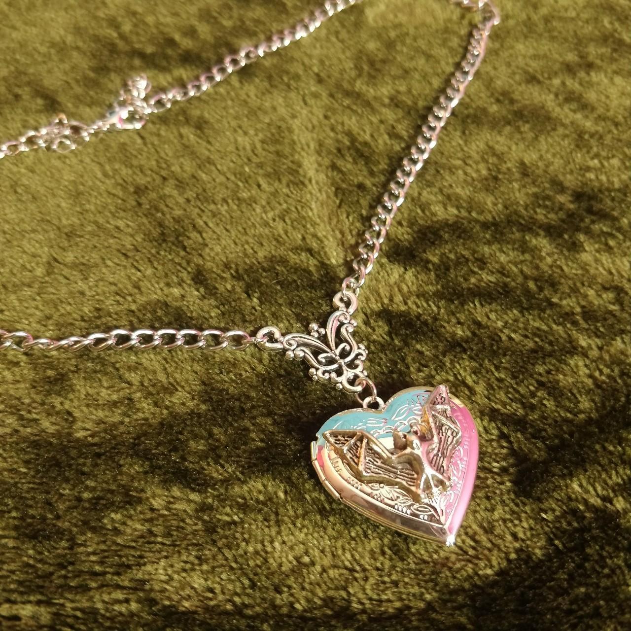 Heart shaped bat locket Locket is openable Chain... - Depop