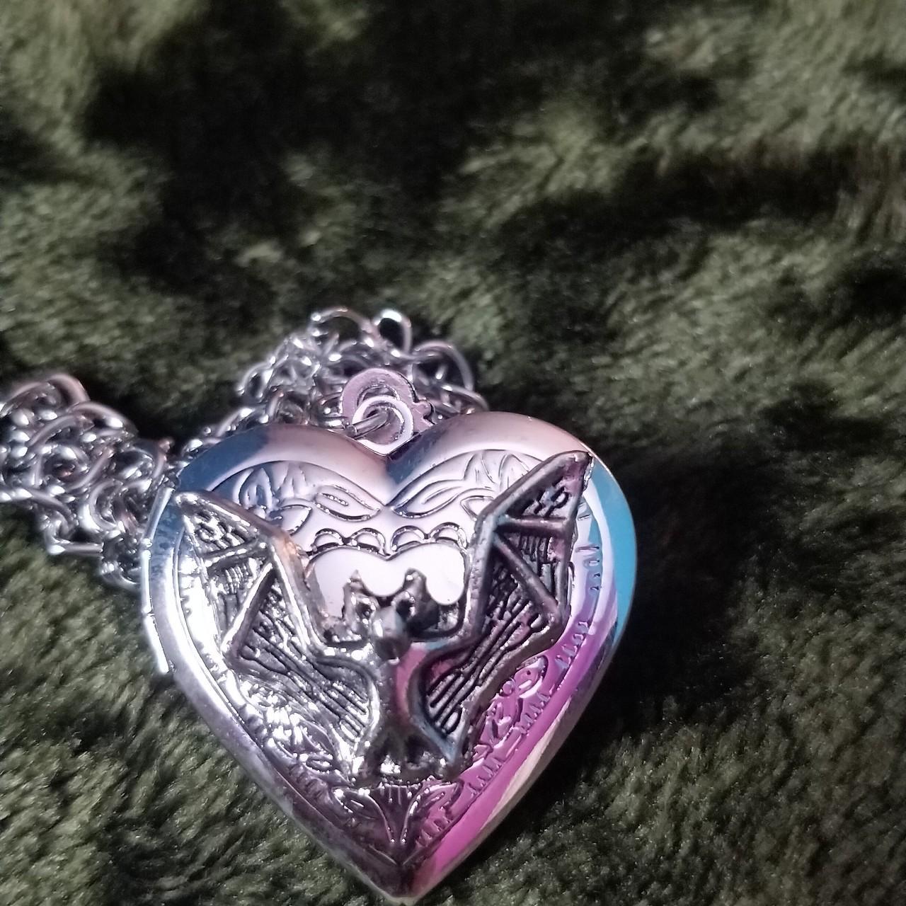 Heart shaped bat locket Locket is openable Chain... - Depop