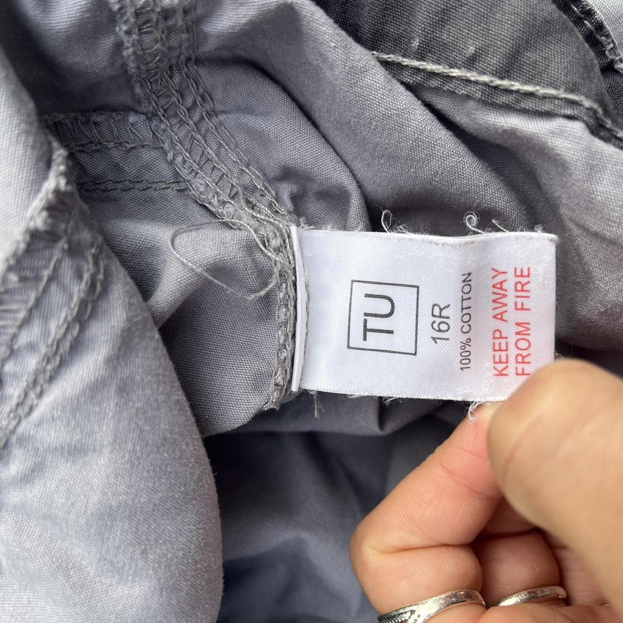 Grey cargo pants. Tag states size 16 R shown on a... - Depop