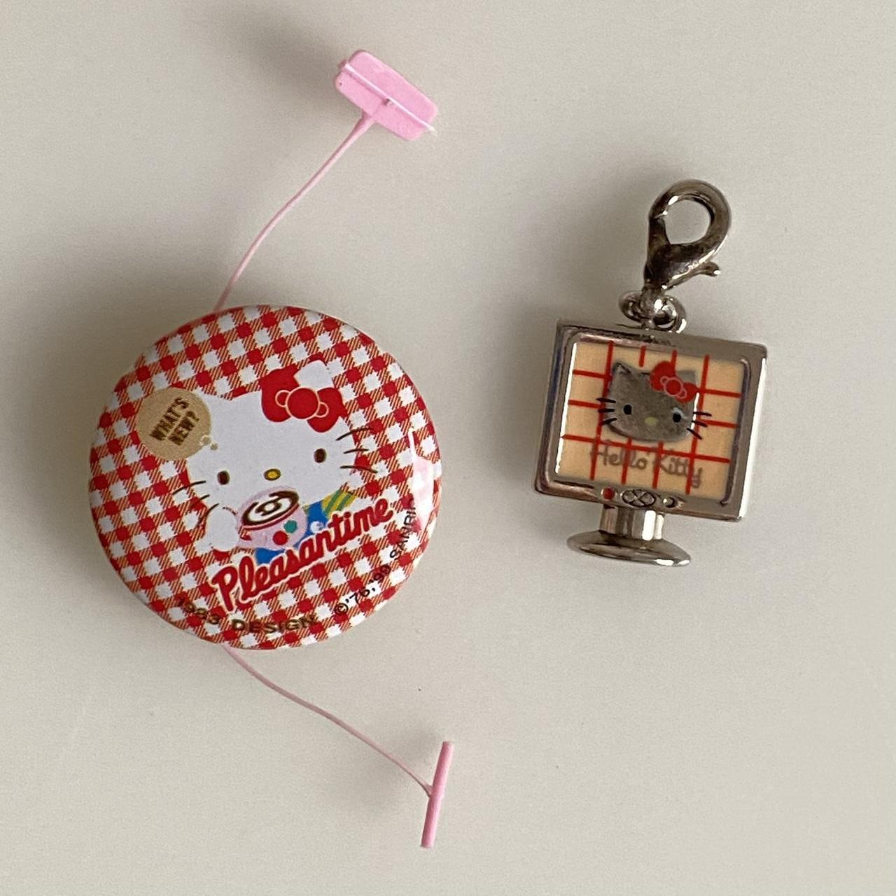 Vintage Hello kitty button and charm Sold as a set... - Depop