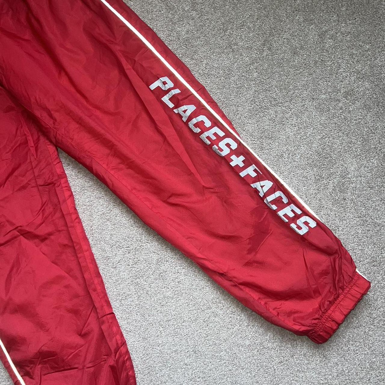 Reflective places plus faces tracksuit trousers,... - Depop
