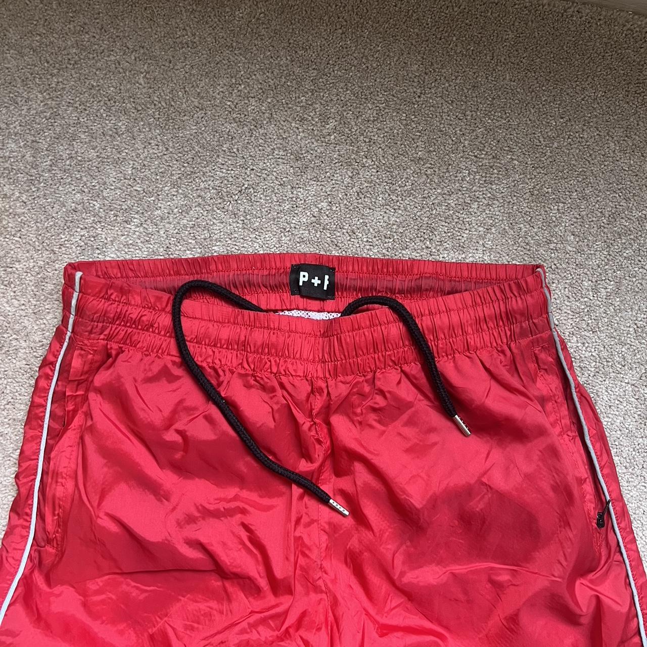 Reflective places plus faces tracksuit trousers,... - Depop