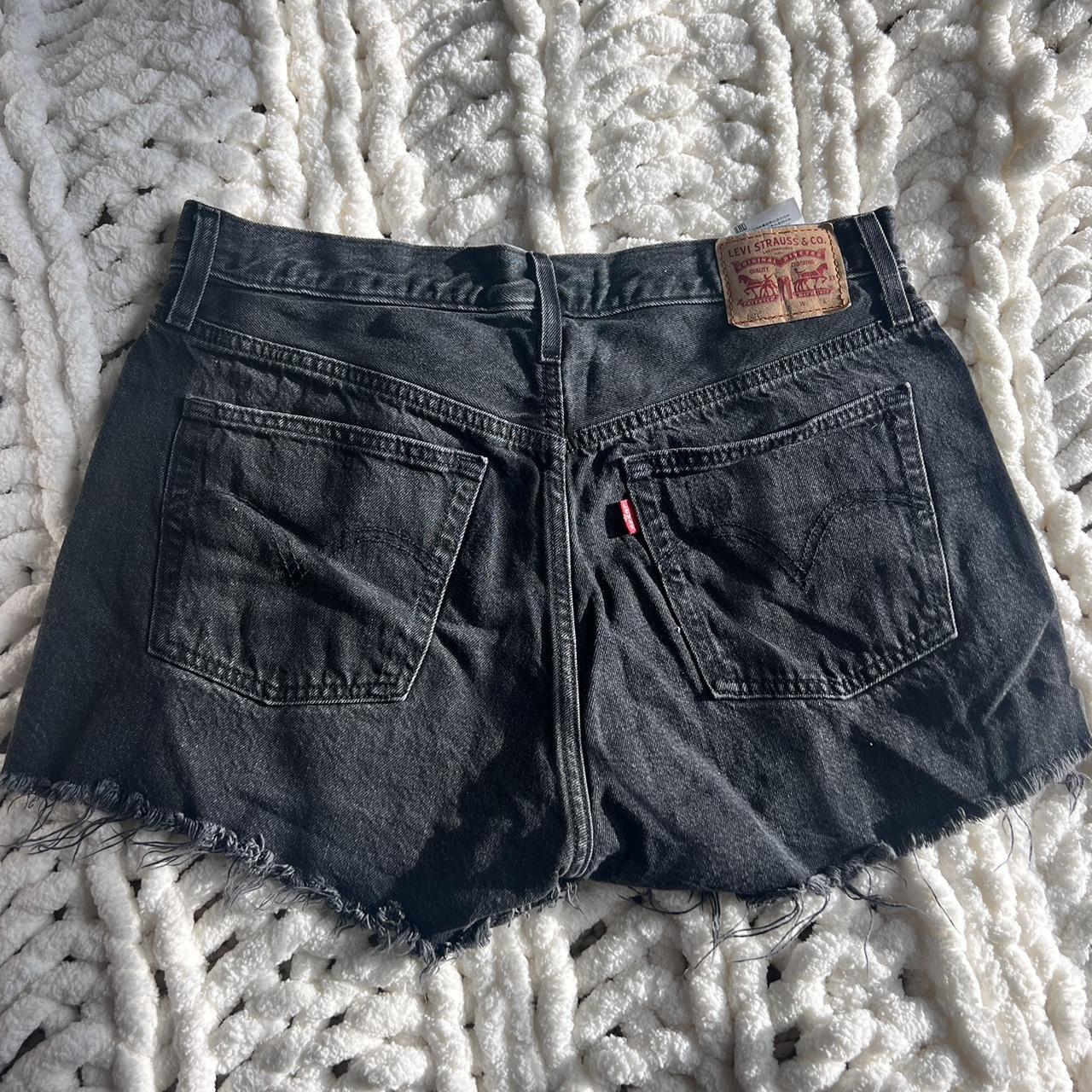 women’s size large black levi shorts! rlly rlly... - Depop