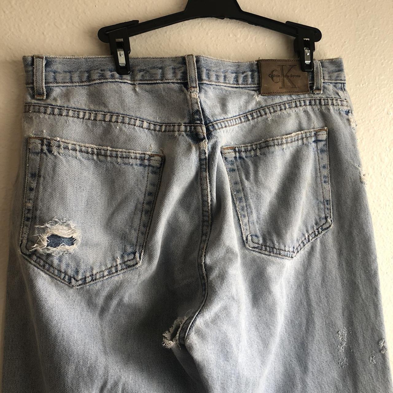 Calvin Klein thrashed jeans unfortunate hole in the... - Depop