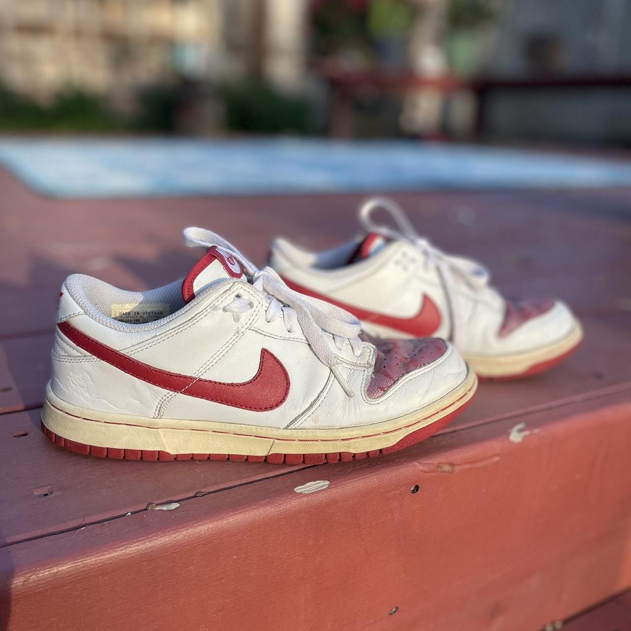 Cute Women’s Nike Dunks. Lace on the toe and red... - Depop