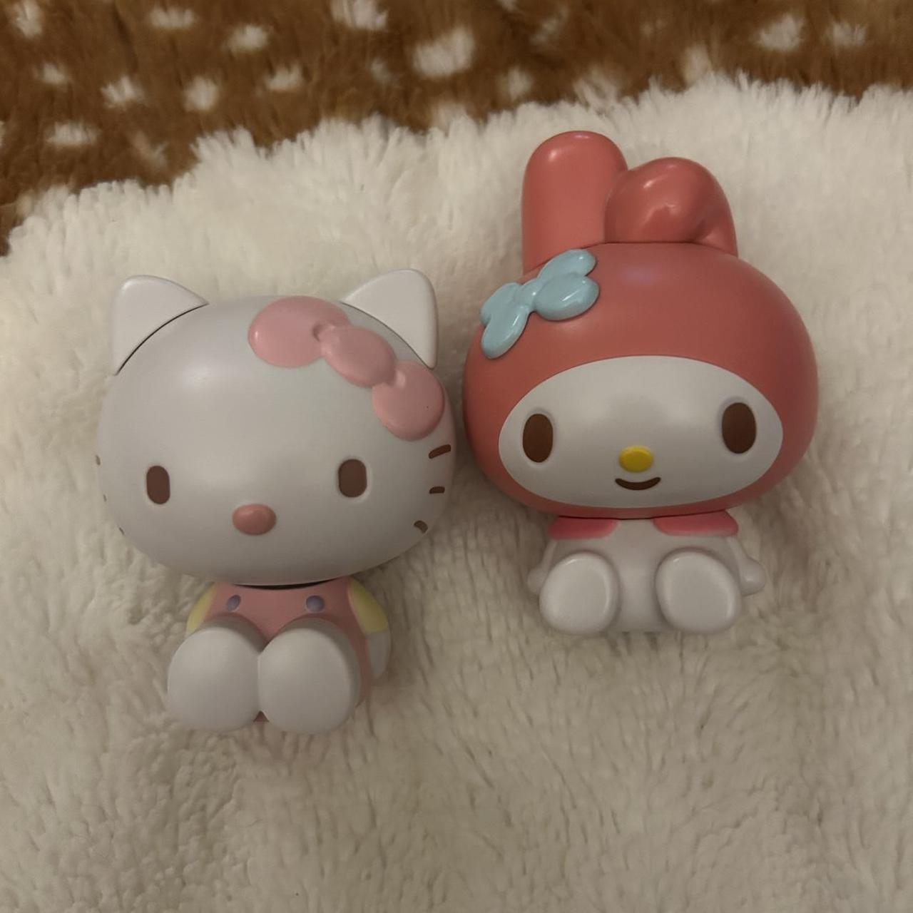 my melody and hello kitty figures so cute. lightly... - Depop