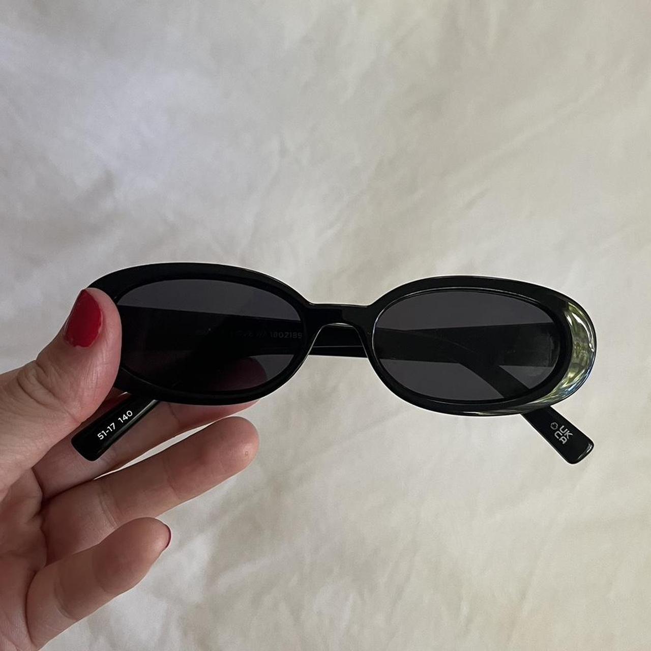 Le Specs black oval sunglasses. Purchased from... - Depop