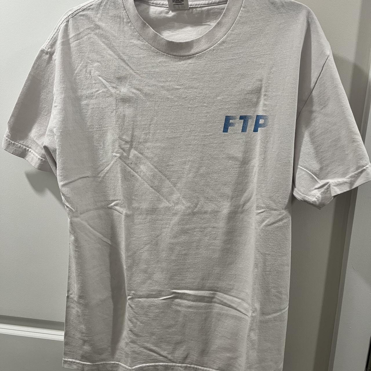 FTP light blue tee. Size large can fit medium too.... - Depop