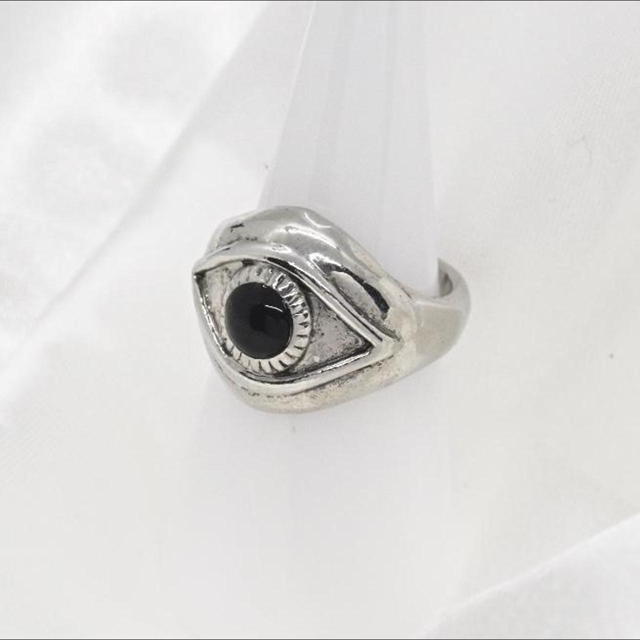 Black Eye Ring A silver eye-shaped ring with a deep... - Depop