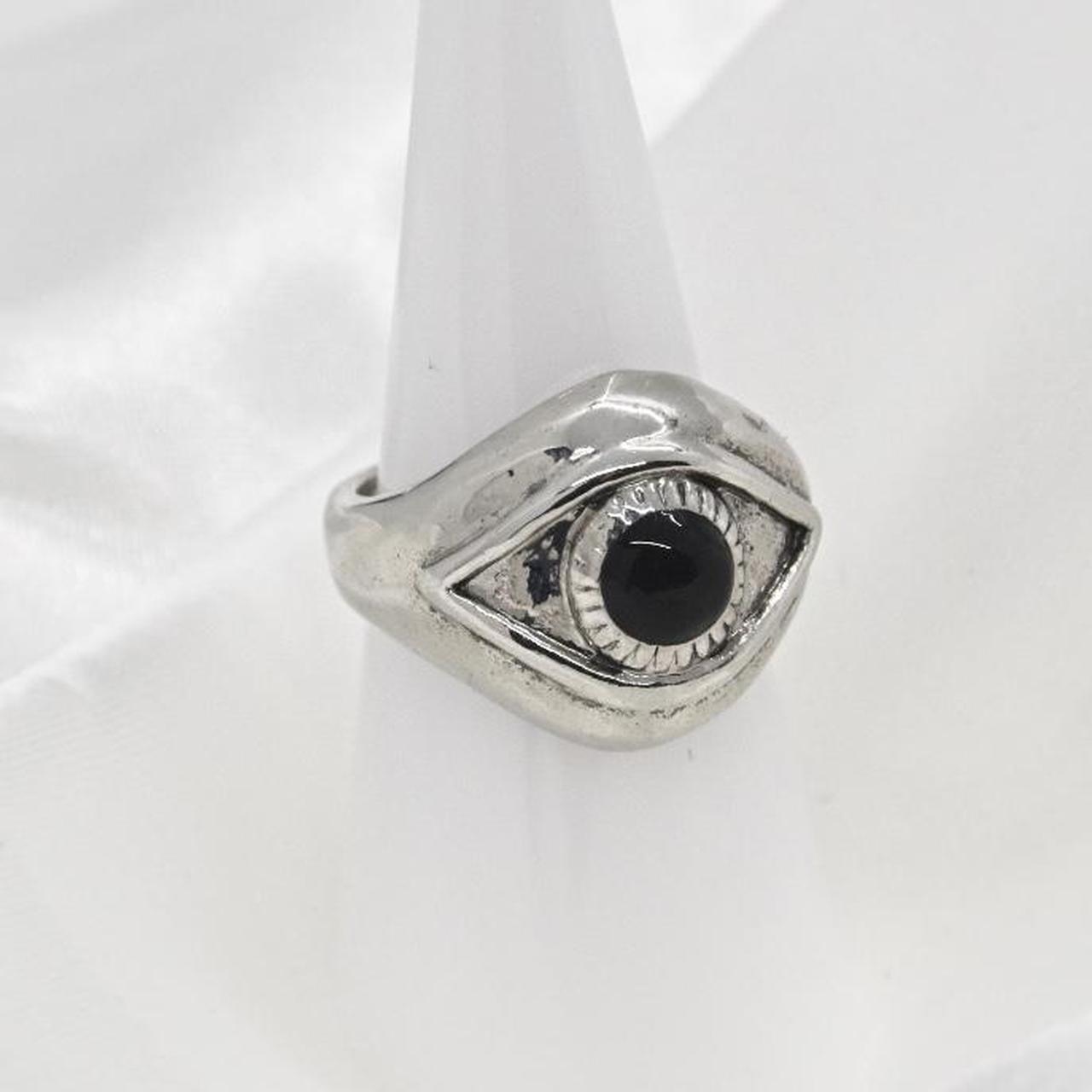 Black Eye Ring A silver eye-shaped ring with a deep... - Depop