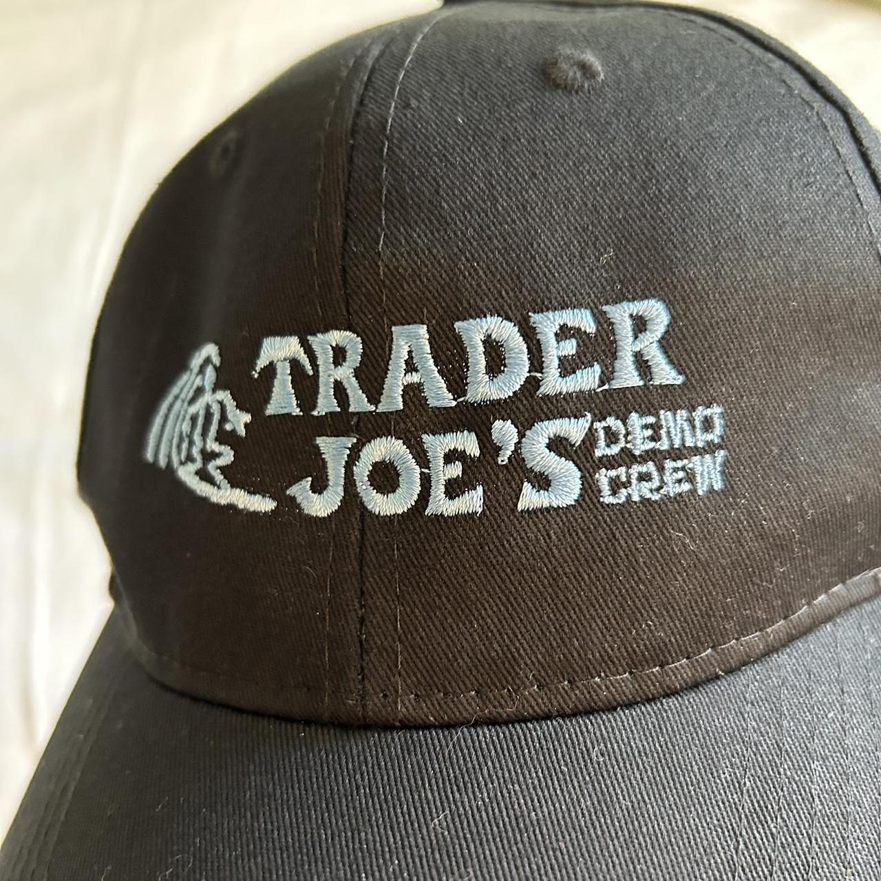Black Trader Joe’s hat with light blue lettering... - Depop