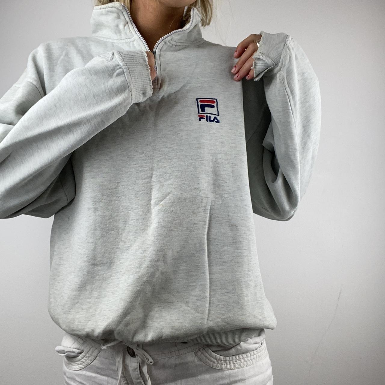 Grey Fila quarter zip jumper. Size M. Obvious signs... - Depop