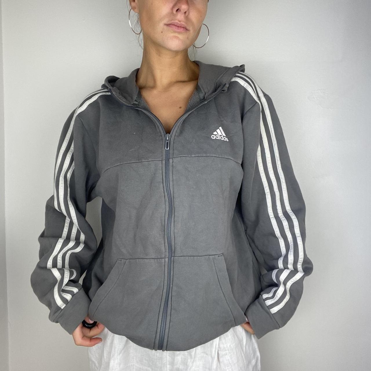 Grey Adidas zip up hoodie with white stripes. size... - Depop