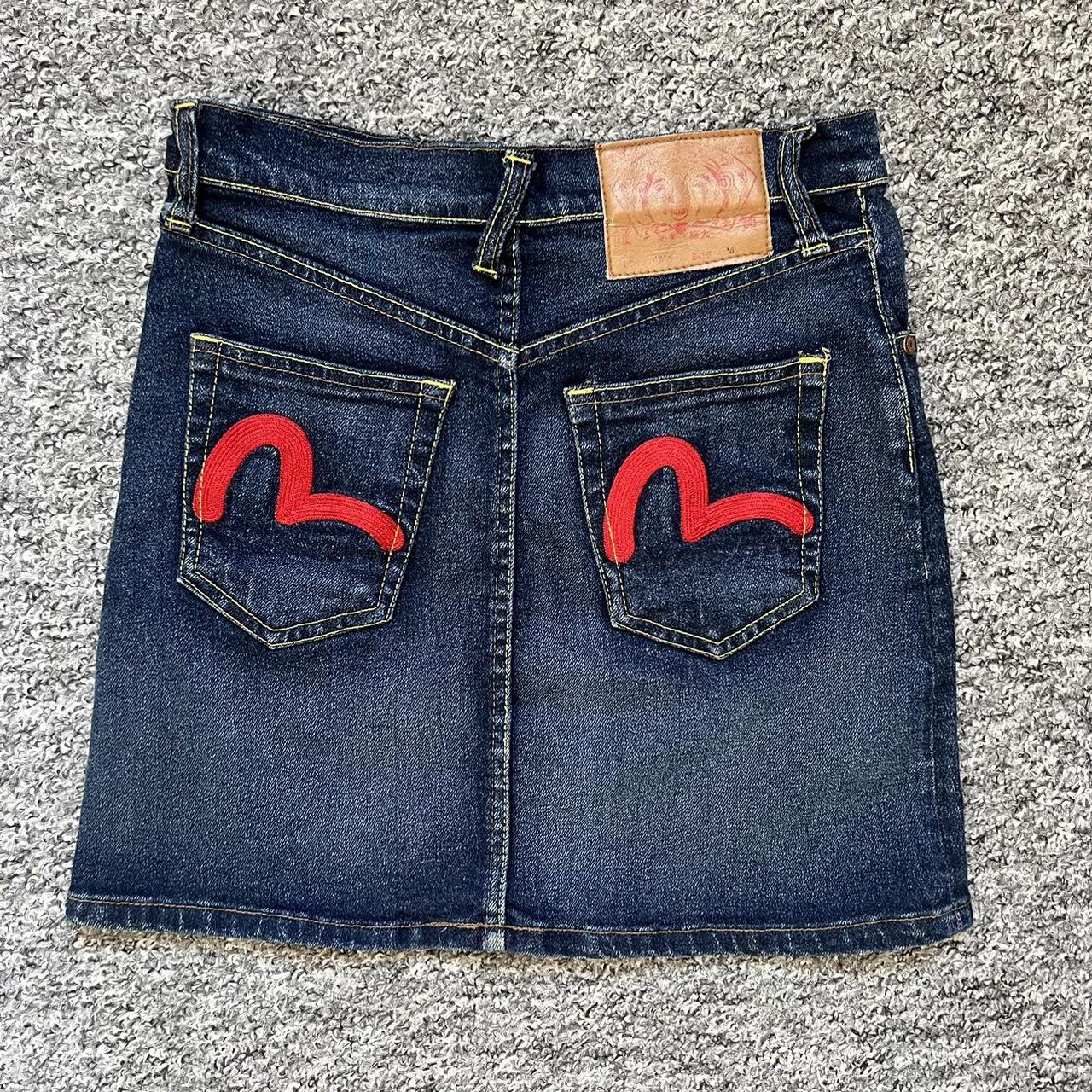Denim Evisu skirt with red embroidered logo into... - Depop