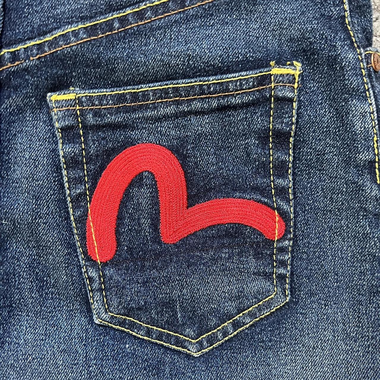 Denim Evisu skirt with red embroidered logo into... - Depop