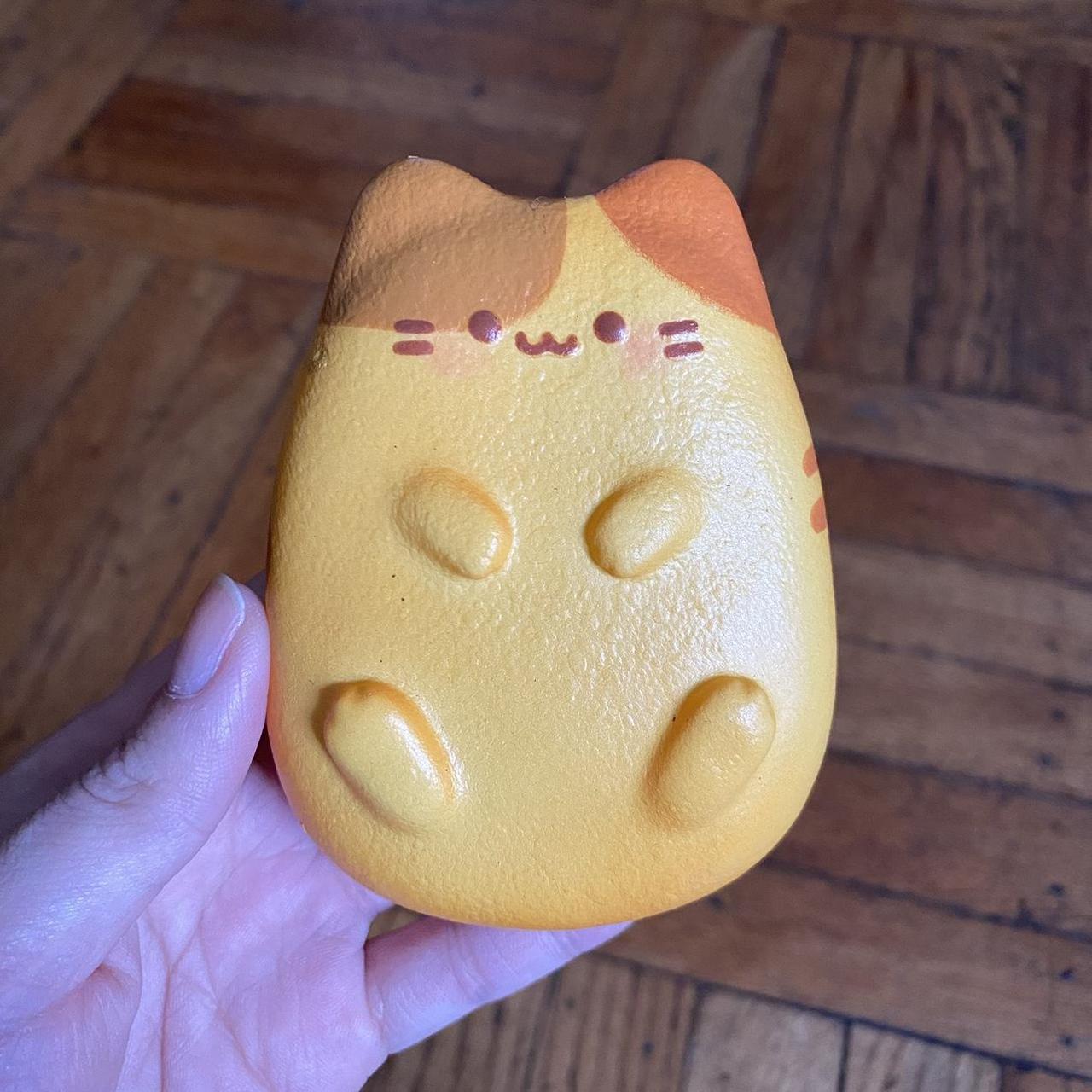 Cat hash brown squishy Designed by Hong Kong... - Depop