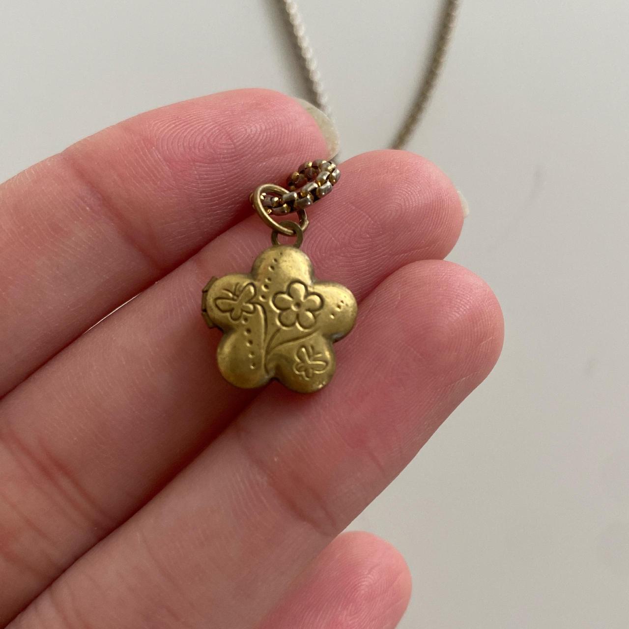 Gold Daisy Locket Necklace Measures at 18” No brand - Depop