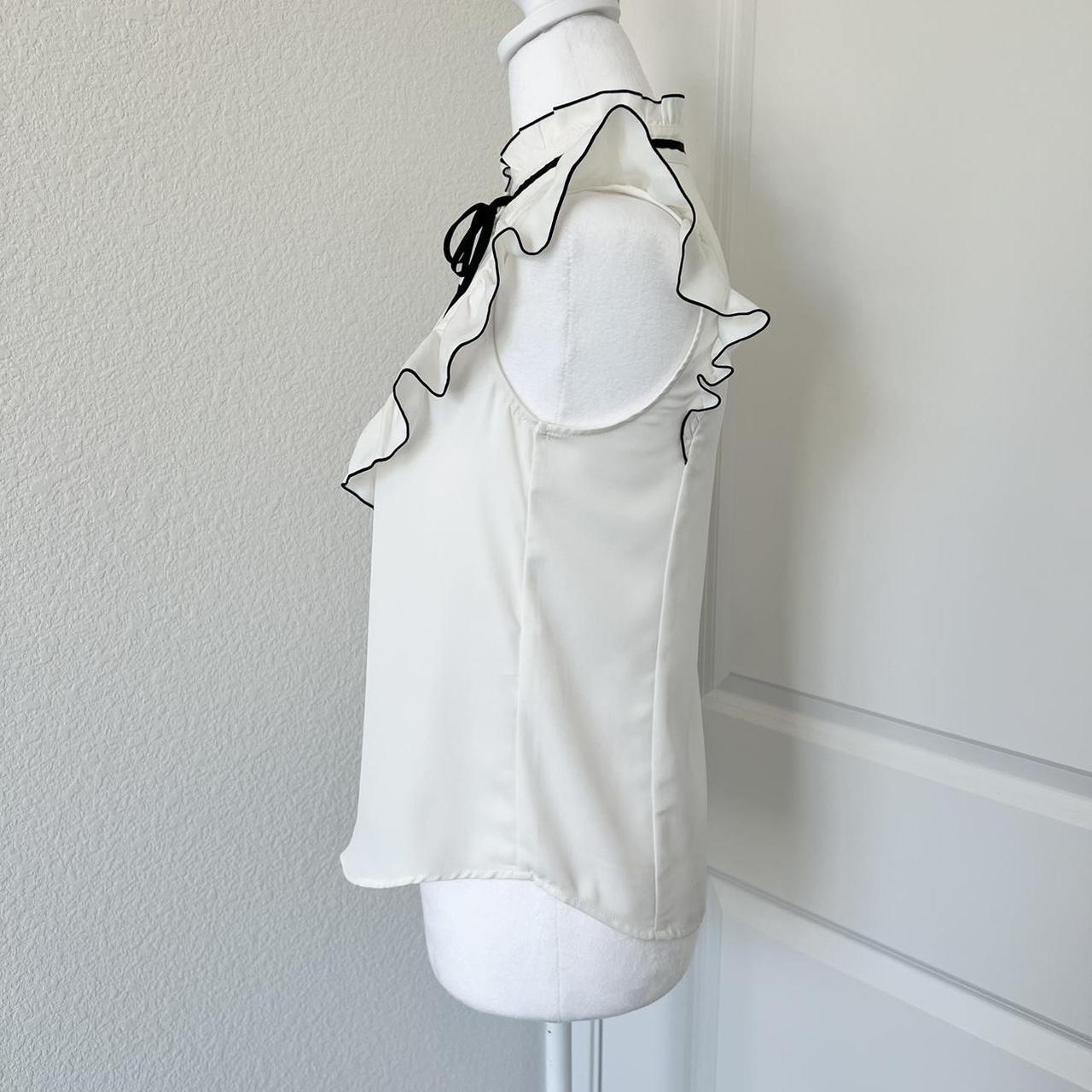 White Sleeveless Ruffle Blouse with Black Details... - Depop